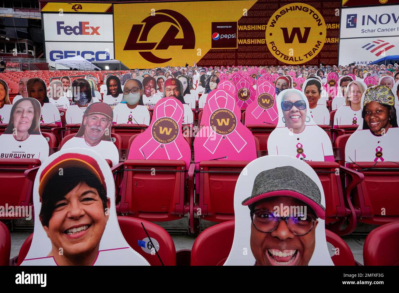 Beast cancer awareness cutouts are seen before an NFL football game ...