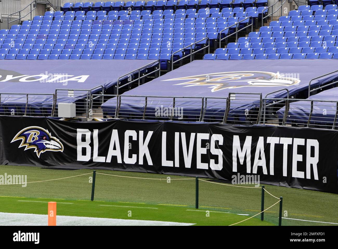A Black lives matter sign sits along the sideline at M&T Bank Stadium ...