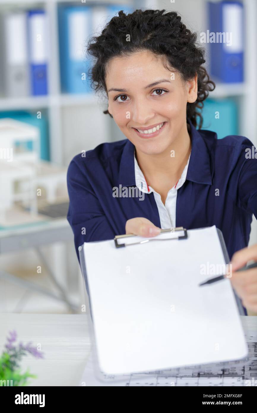 business woman asking for a signature Stock Photo - Alamy