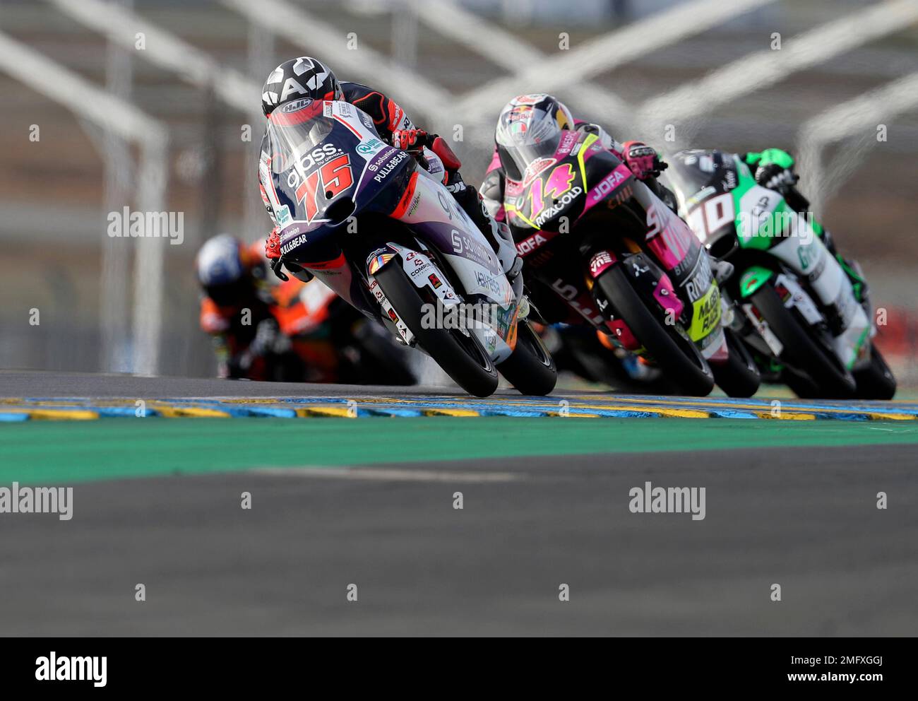 Spain's rider Albert Arenas of the Gaviota Aspar Team Moto3 steers his ...