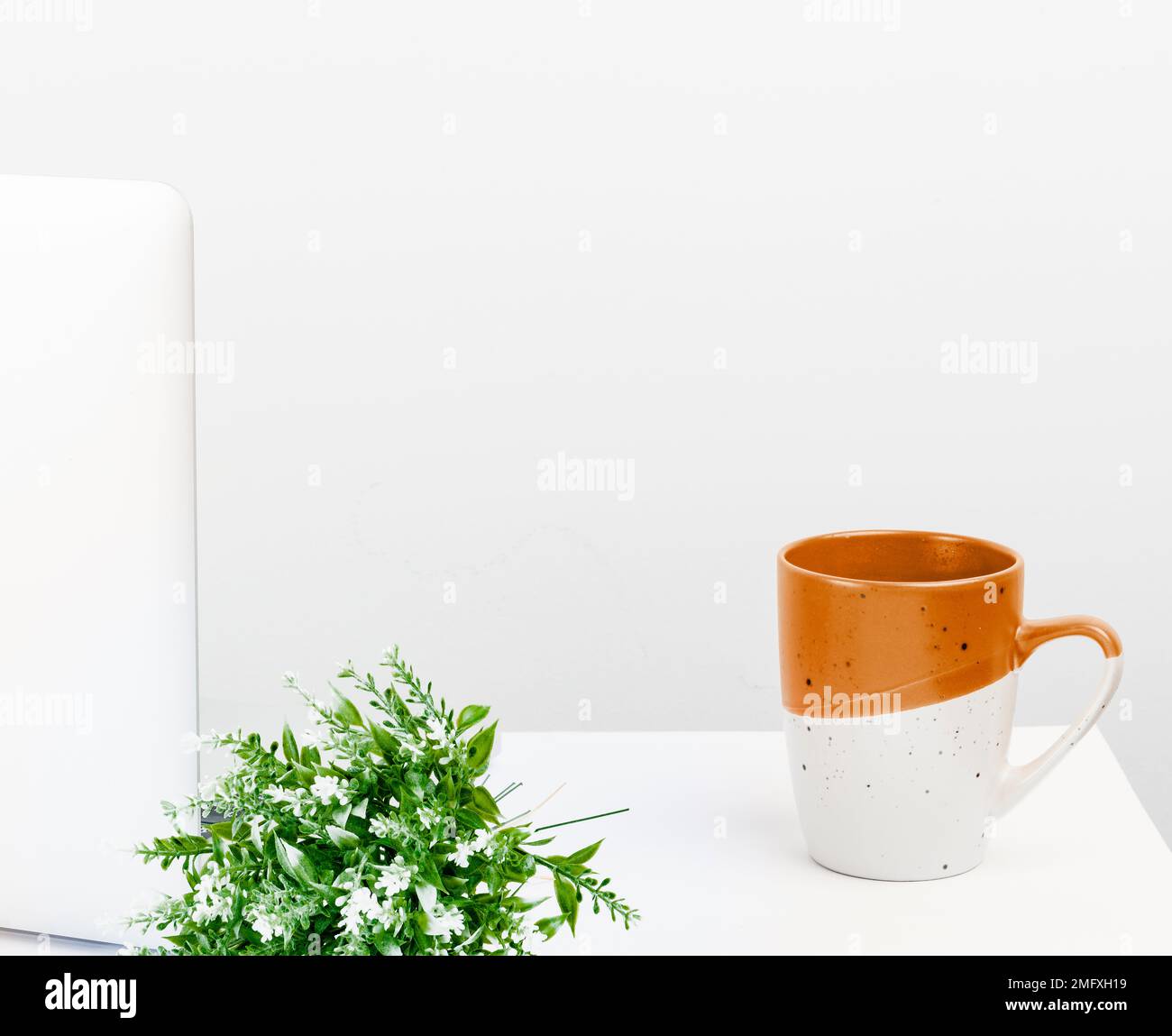 Coffee Cup Standing on Desk. Important infrormation written on paper ...