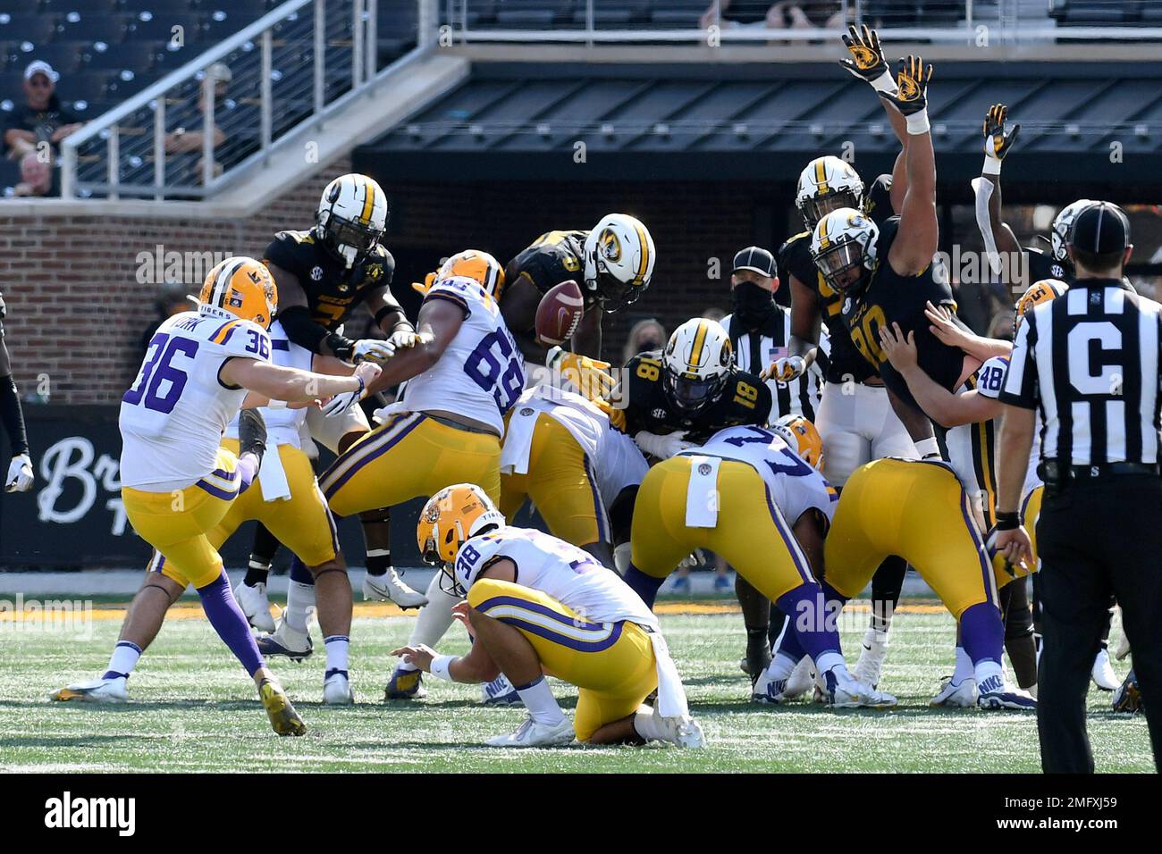 Members of the Missouri defense block a field goal attempt by LSU place ...