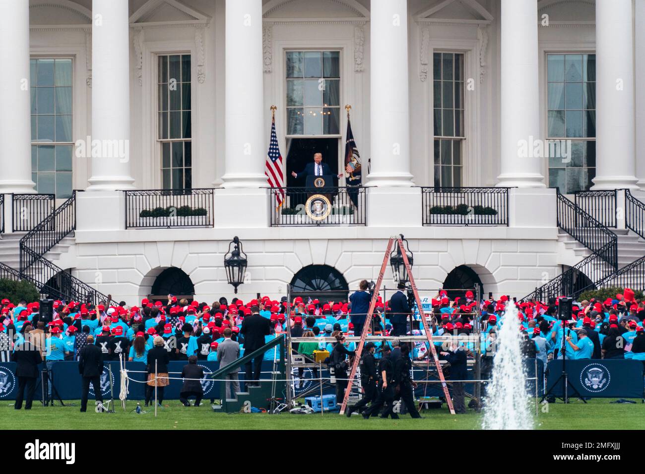 President Donald Trump speaks from the Blue Room Balcony of the White ...