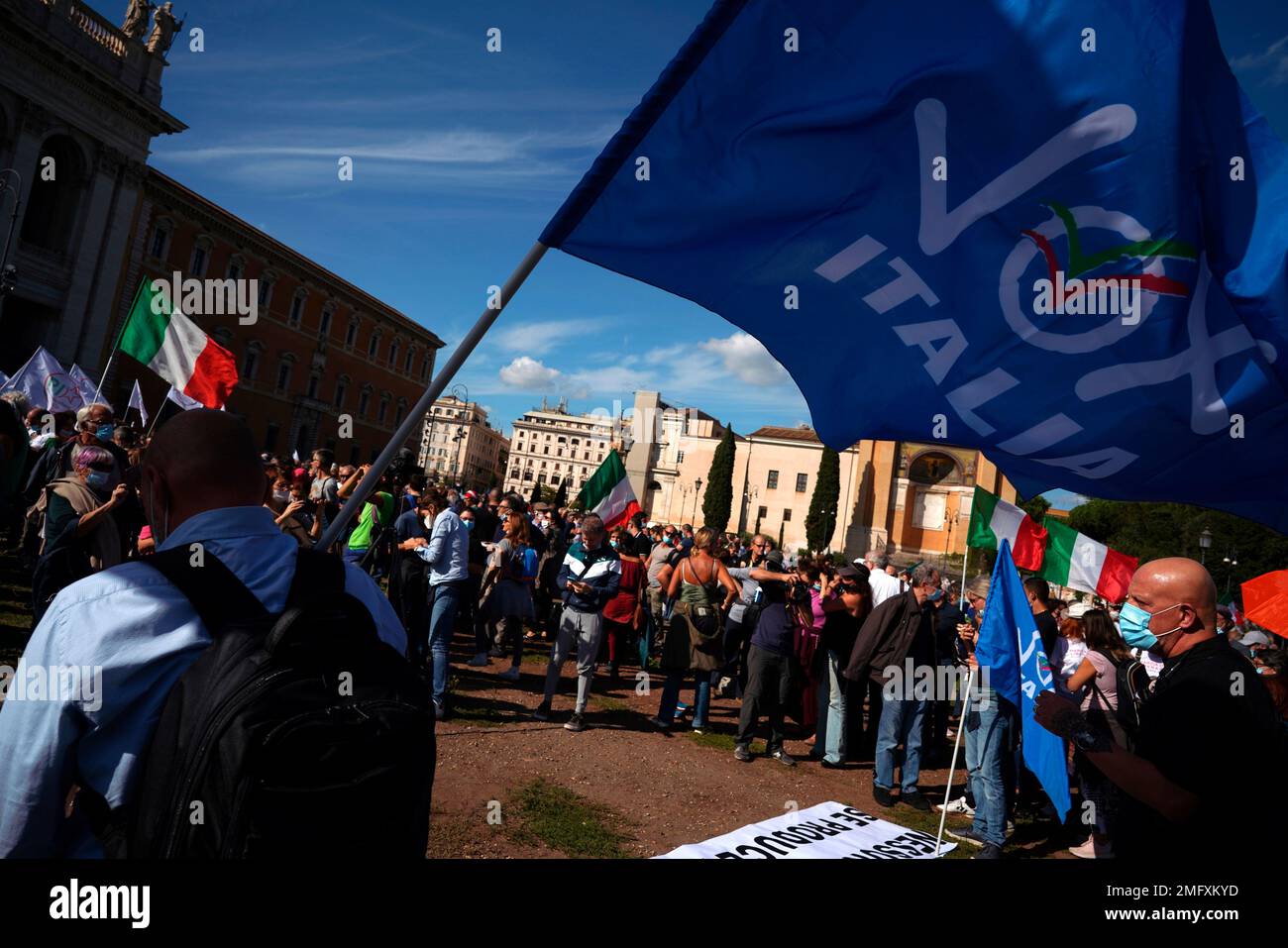 People gather to protest against the government restriction measures to ...