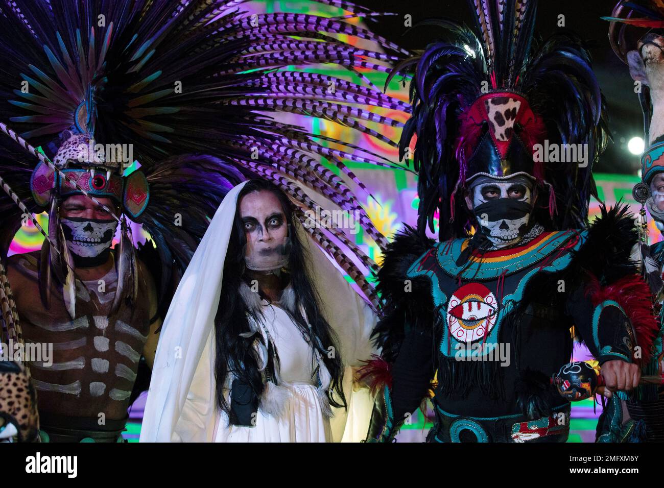 Actress Nayeli Cortes dressed as the La Llorona character, carries a ...
