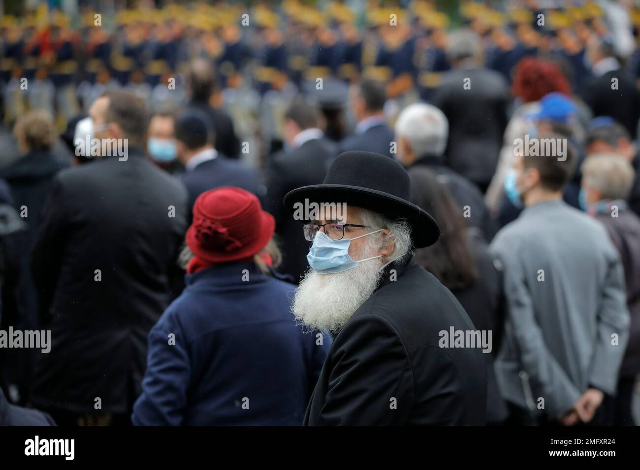 Rabbi Rafael Schaffer, wearing a mask for protection against the COVID ...