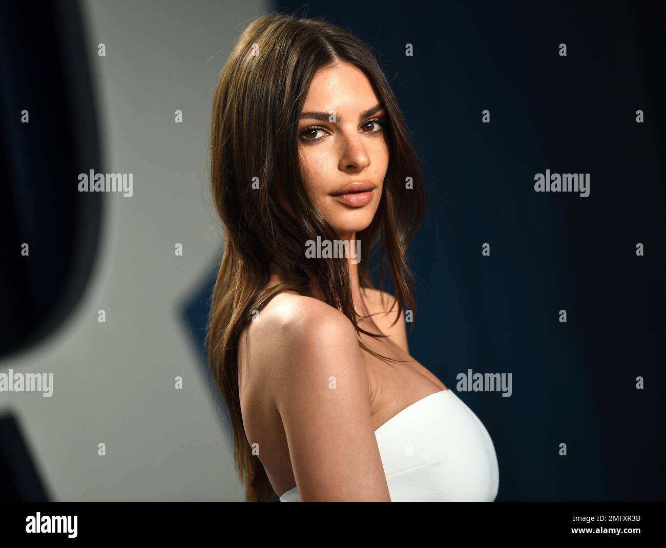 FILE - Model Emily Ratajkowski arrives at the Vanity Fair Oscar Party ...