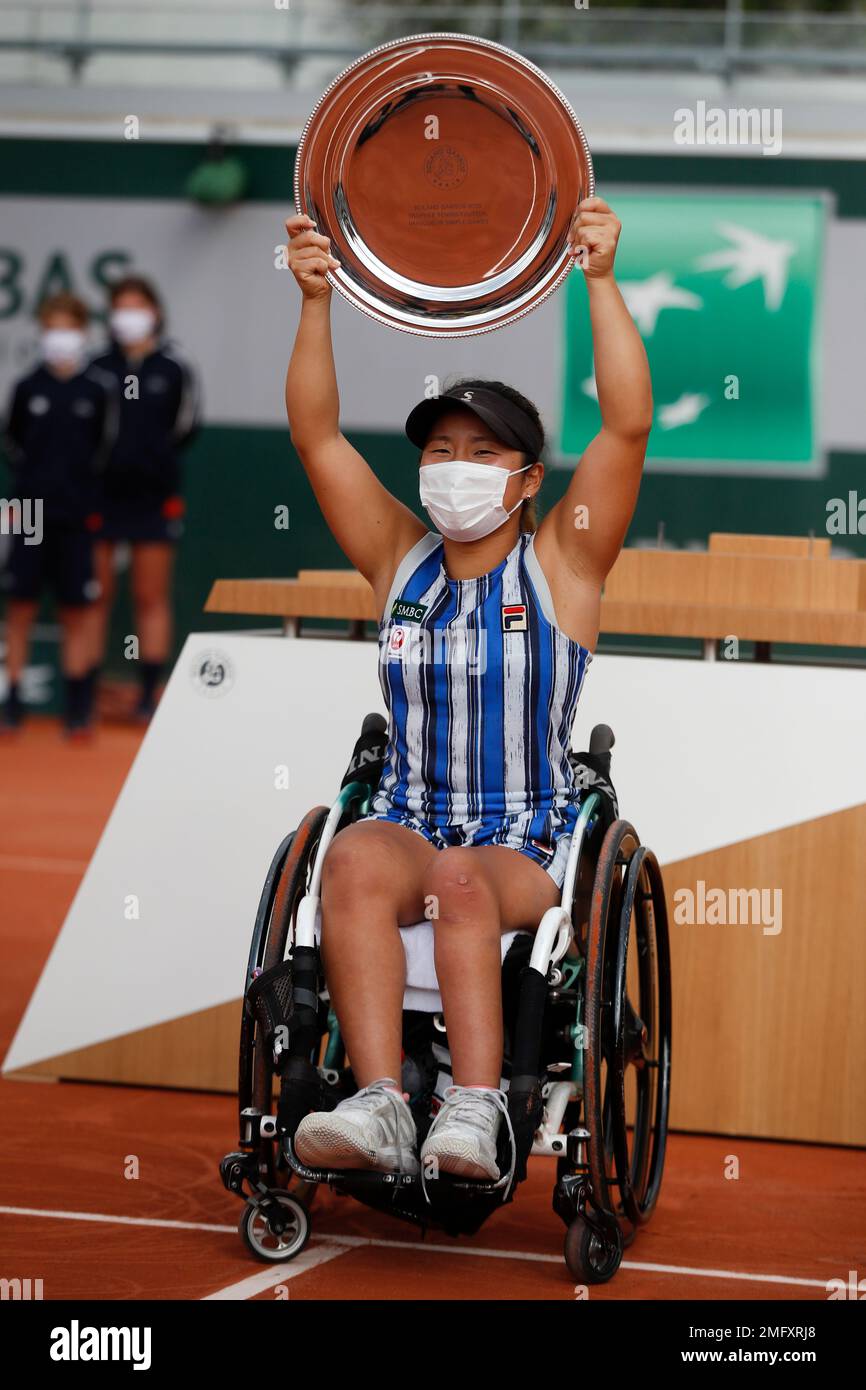 Japan's Yui Kamiji holds her trophy after winning the women's ...