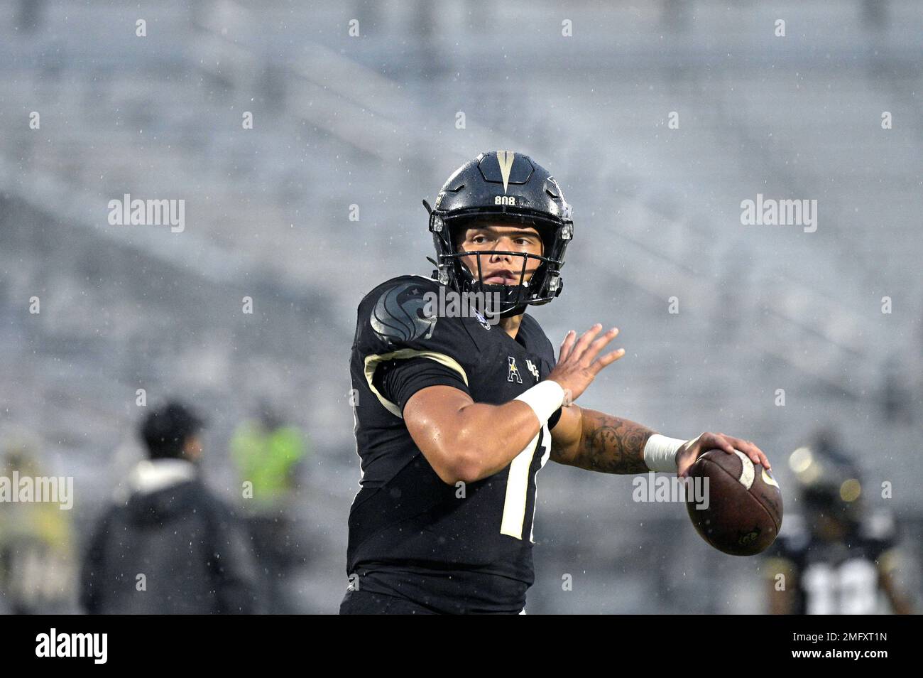 Central Florida quarterback Dillon Gabriel (11) warms up before an NCAA ...