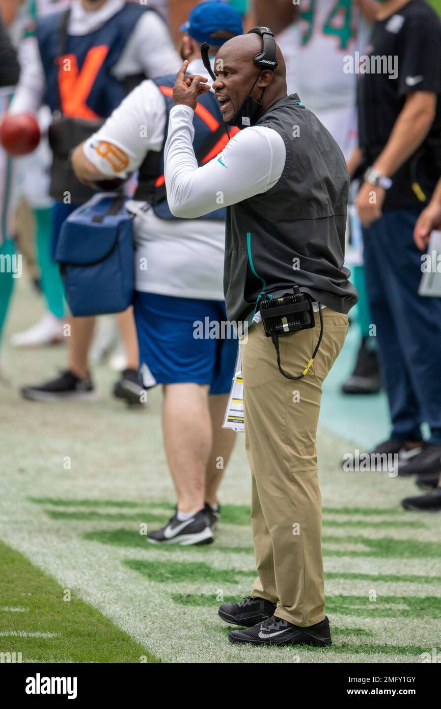Miami Dolphins head coach Brian Flores wearing a mask with the Crucial ...