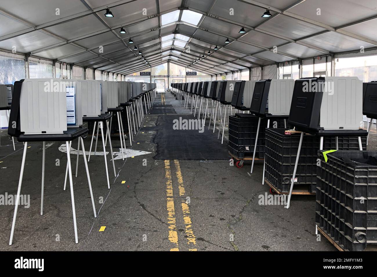 Voting booths are shown inside a voting center near City Hall Thursday ...