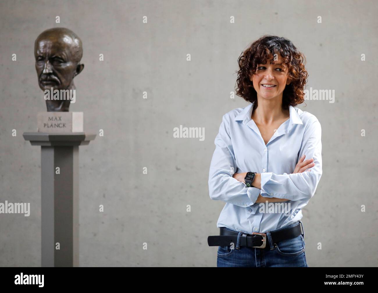 French microbiologist Emmanuelle Charpentier poses near a statue of Max ...