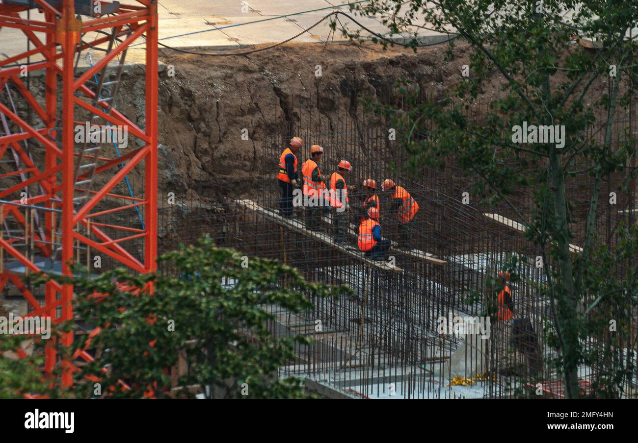 building workers team stand in a row in construction site pit Stock ...