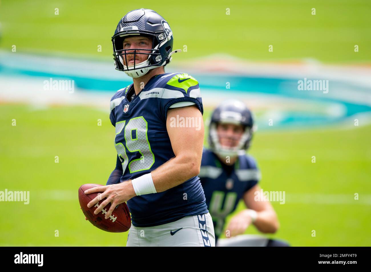 Seattle Seahawks long snapper Tyler Ott (69) holds the ball on the ...