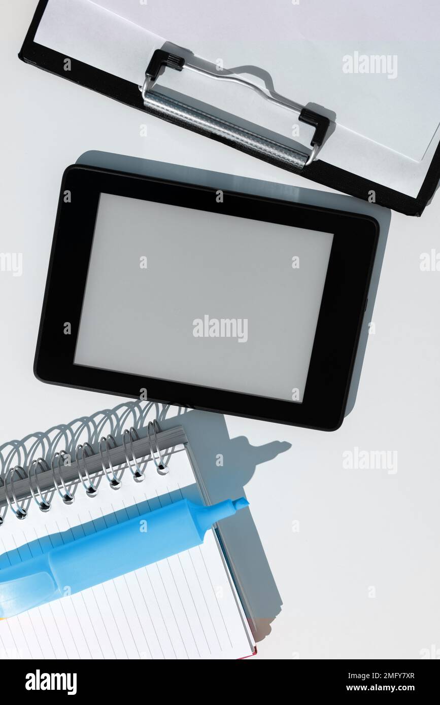 Tablet Screen With Important Ideas On It And Note Sticked On It On Desk ...