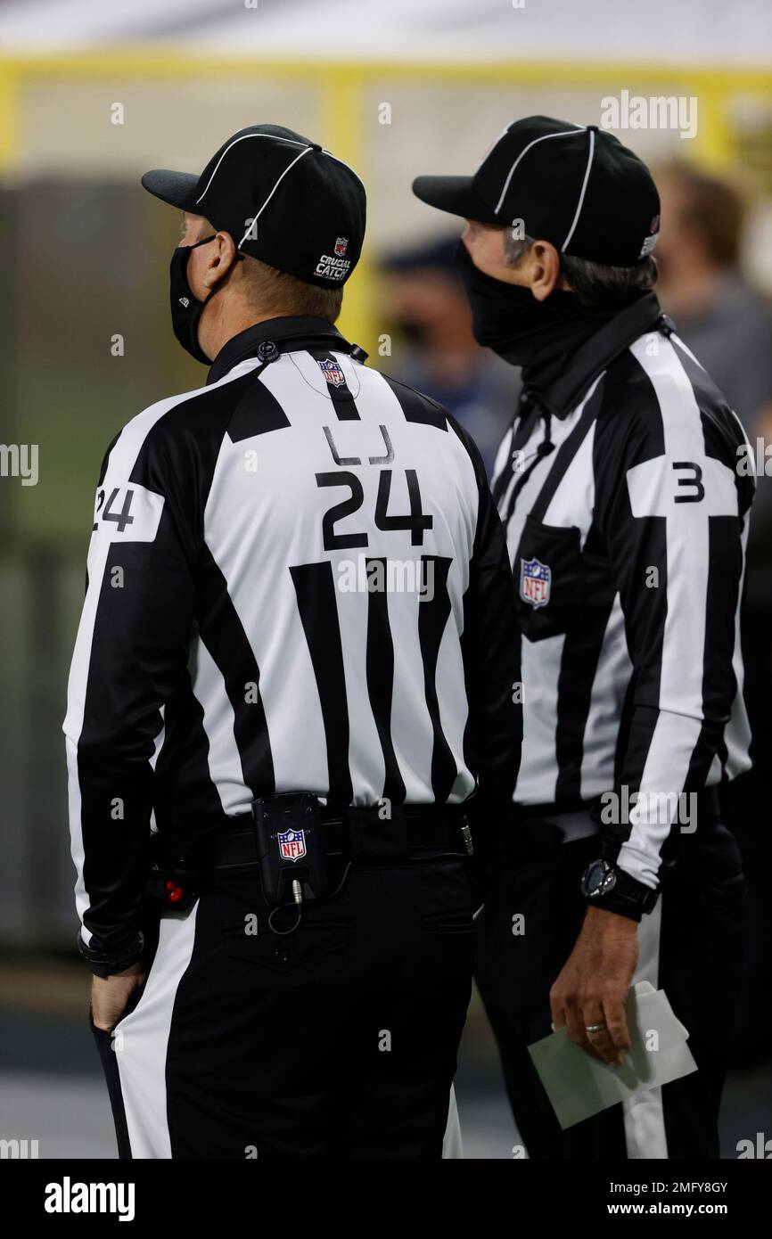Line Judge David Oliver(24) and Field Judge Scott Edwards(3) before an ...