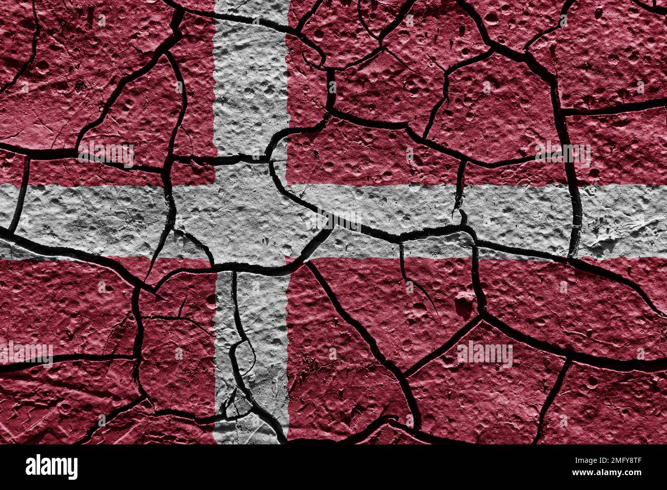 Denmark flag on a mud texture of dry crack on the ground Stock Photo ...