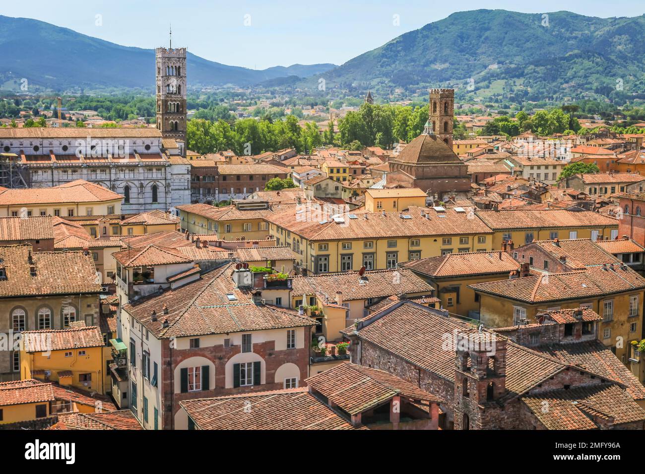 Historical medieval town Lucca with old buildings and towers, Tuscany ...