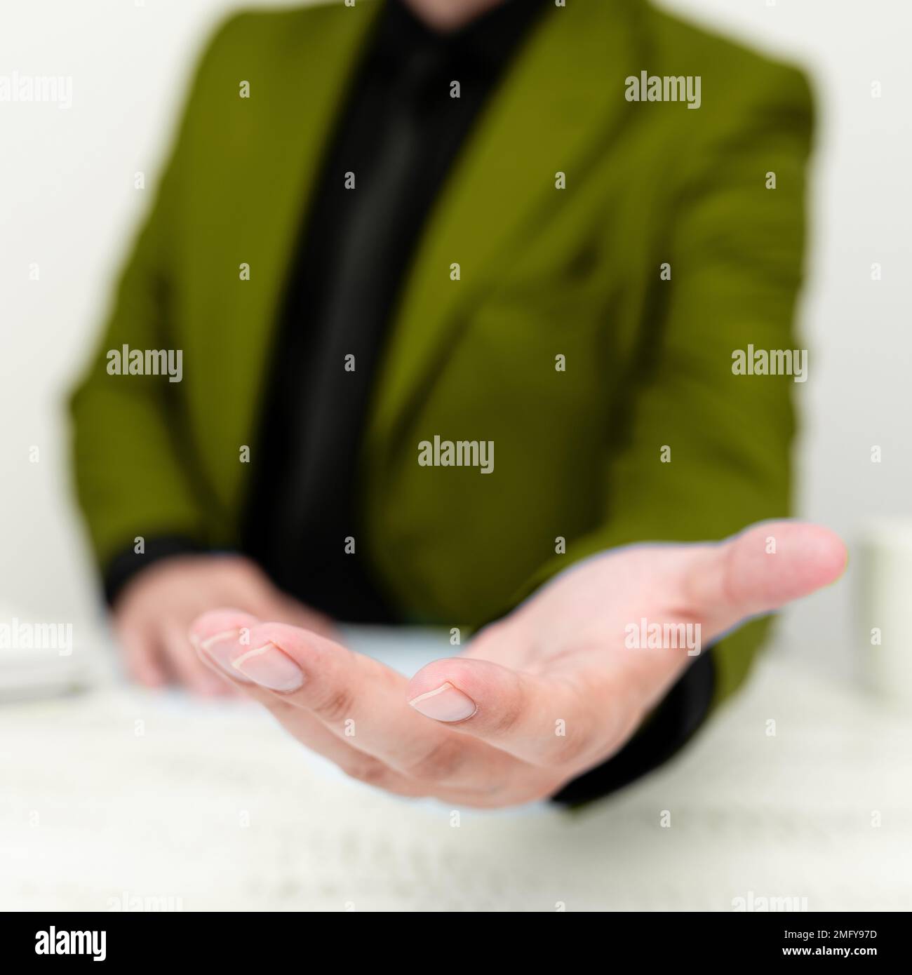 Businessman in Green jacket Holding Important Message In One Hand. Man ...