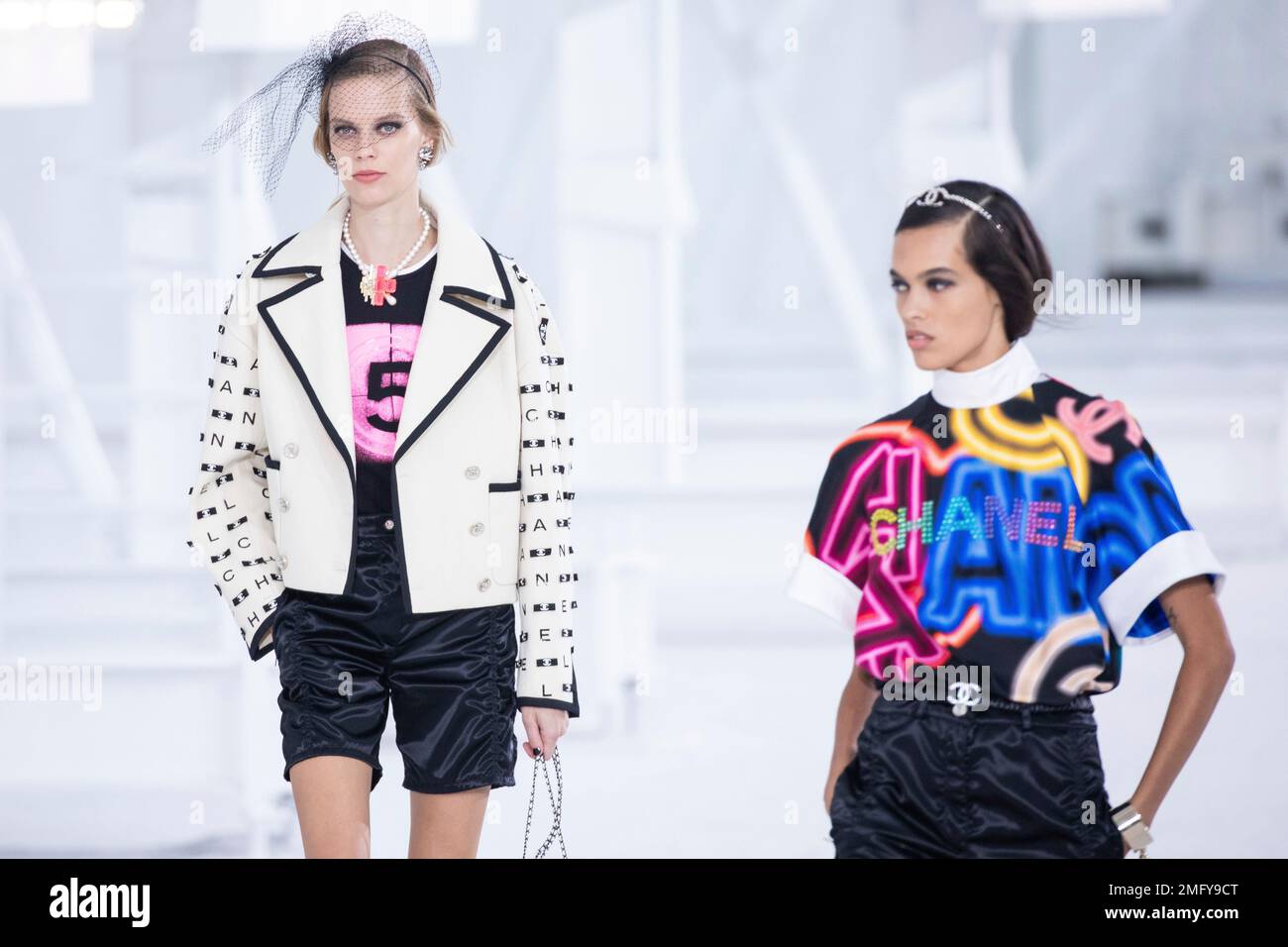 Models wear creations for the Chanel Spring-Summer 2021 fashion ...