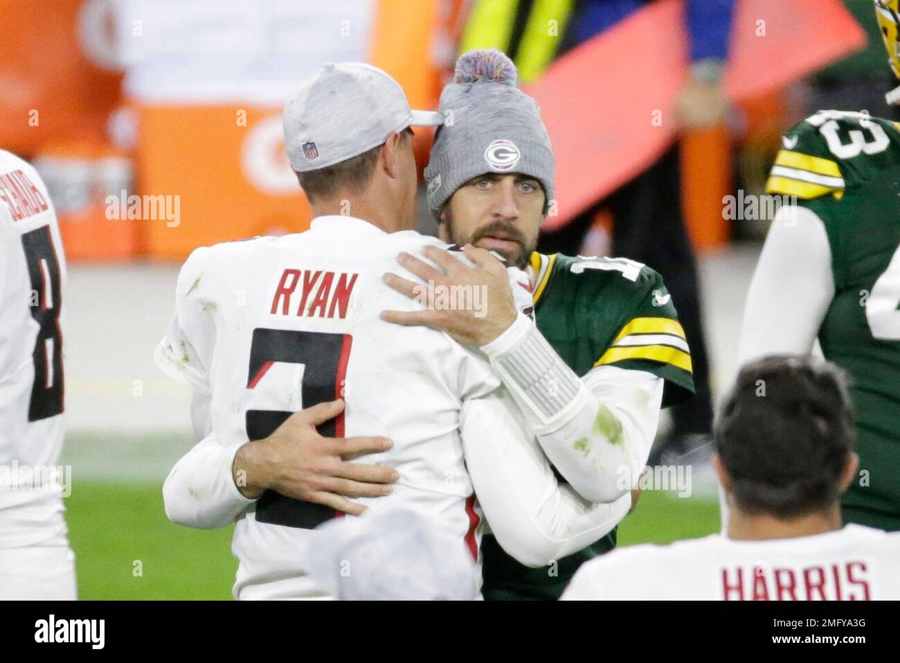 Green Bay Packers quarterback Aaron Rodgers (12) hugs Atlanta Falcons ...
