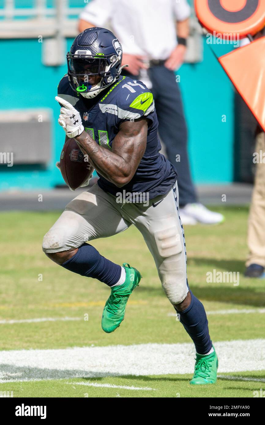 Seattle Seahawks wide receiver DK Metcalf (14) (26) runs with the ball ...
