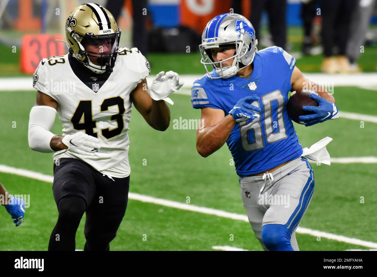 Detroit Lions wide receiver Danny Amendola runs with the ball after a ...