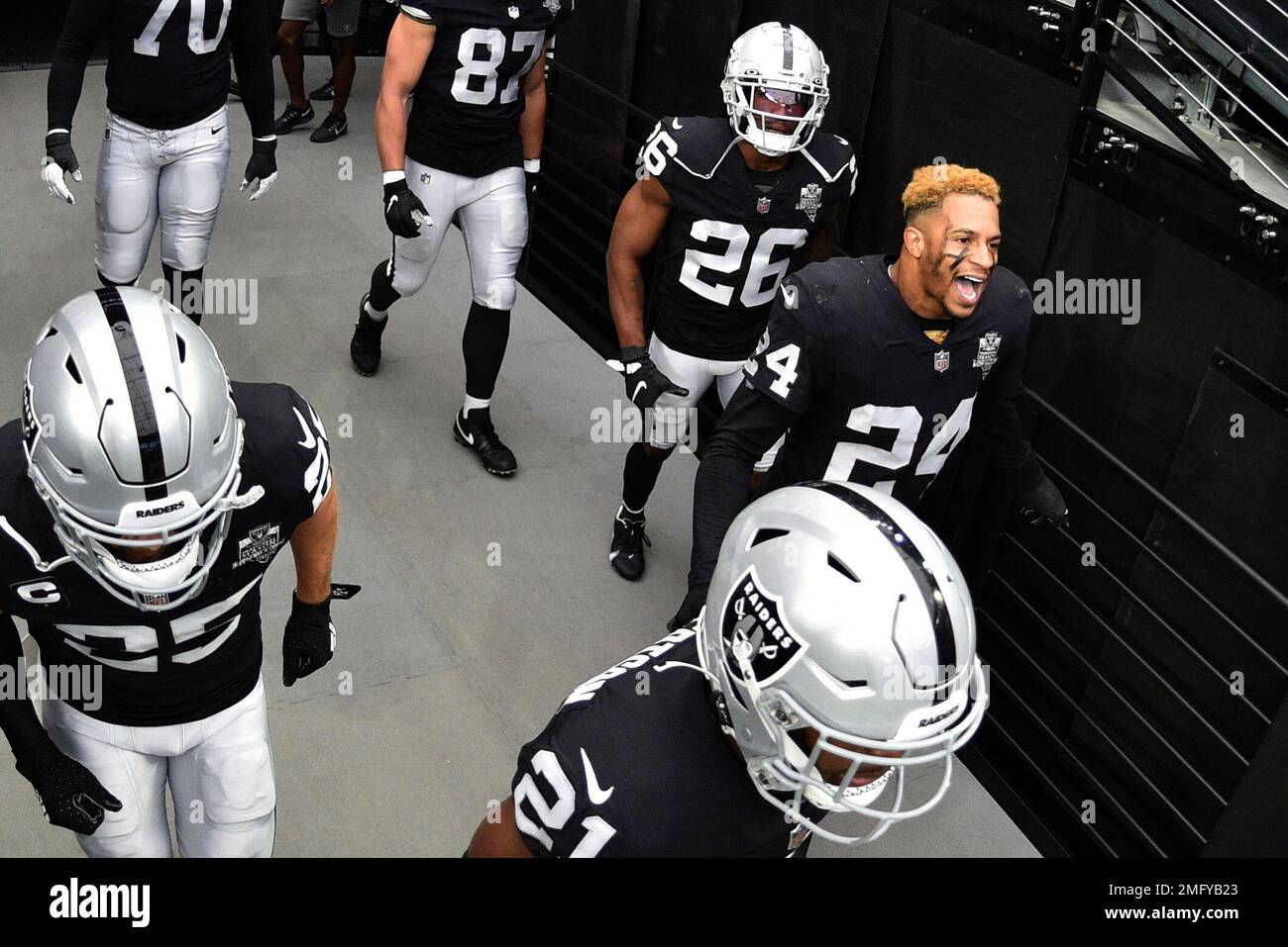 The Las Vegas Raiders line up before taking the field for their NFL ...