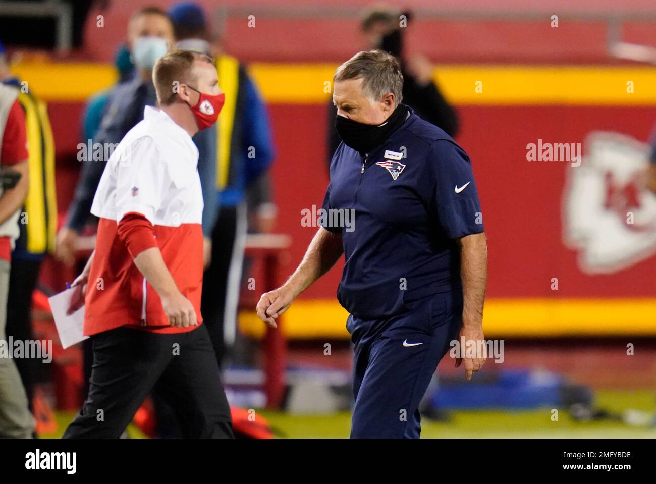 New England Patriots head coach Bill Belichick walks off the field ...
