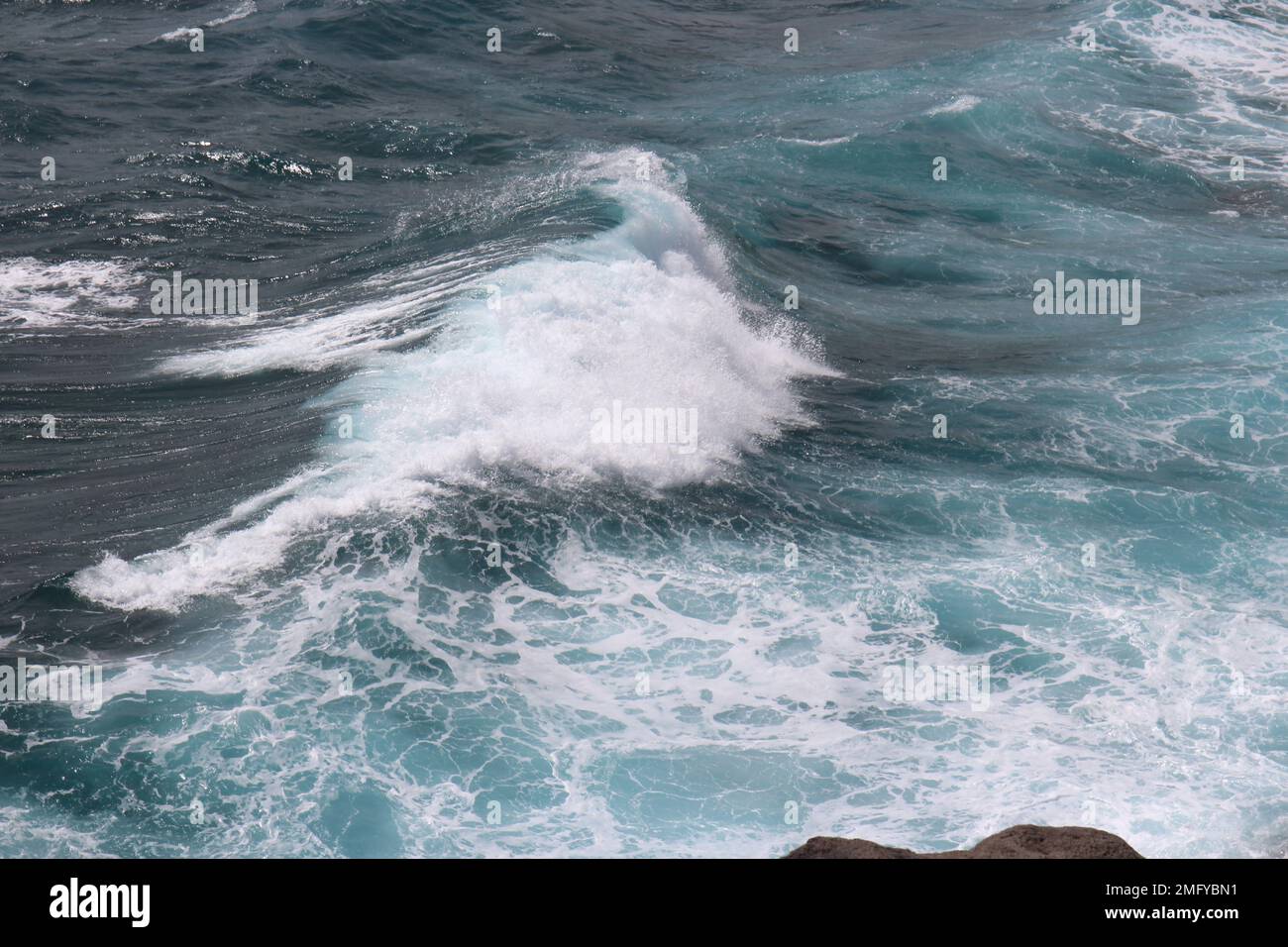 Small waves in the Pacific Ocean off the coast of Kauai, Hawaii, USA in ...