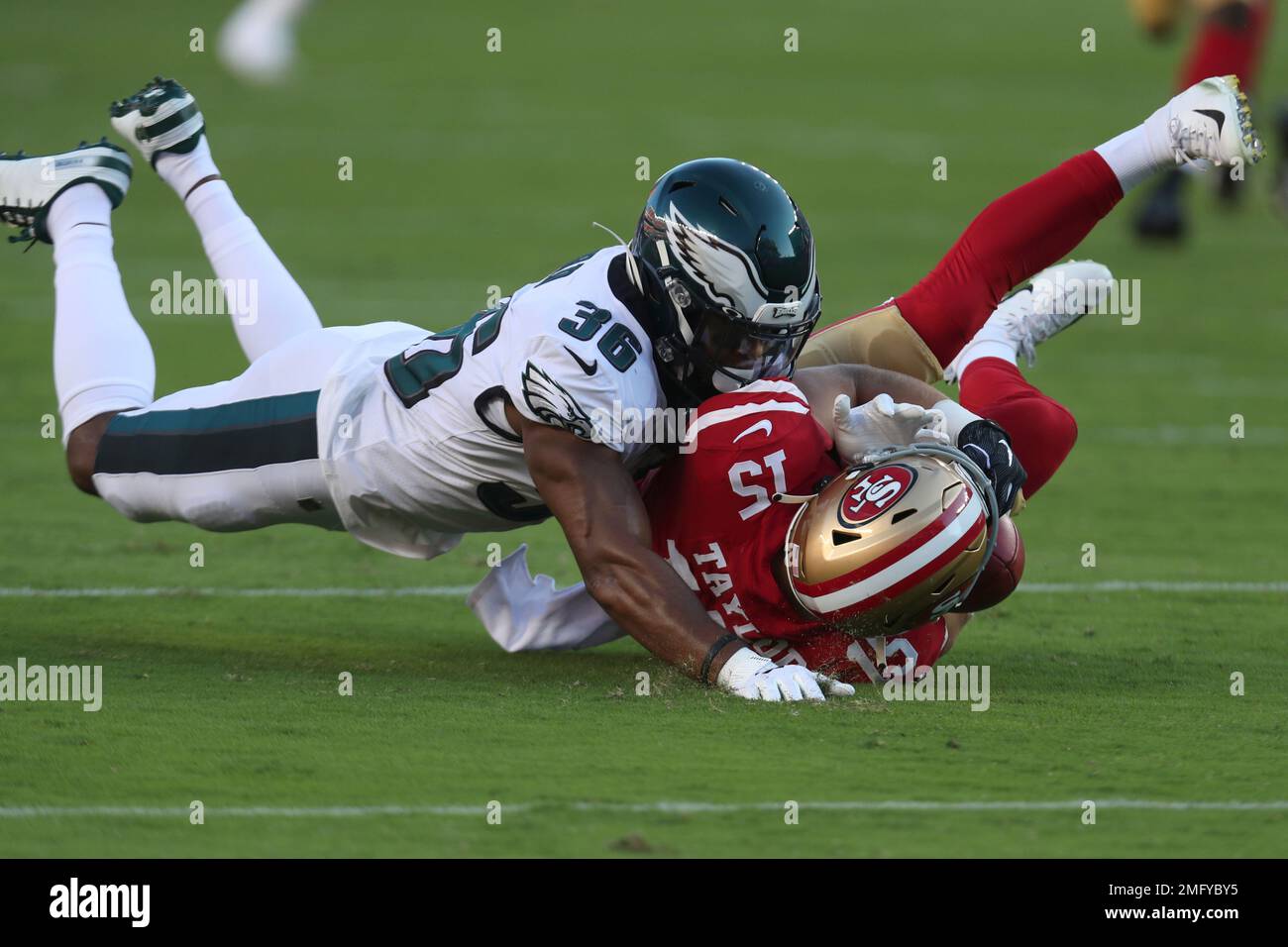 Philadelphia Eagles' Rudy Ford (36) tackles San Francisco 49ers' Trent ...