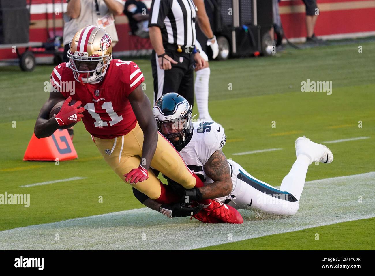 San Francisco 49ers wide receiver Brandon Aiyuk (11) scores past ...