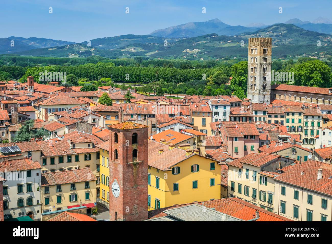 Historical medieval town Lucca with old buildings and towers, Tuscany ...