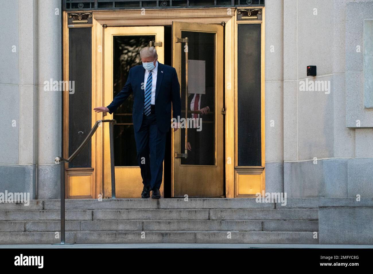 President Donald Trump walks out of Walter Reed National Military ...