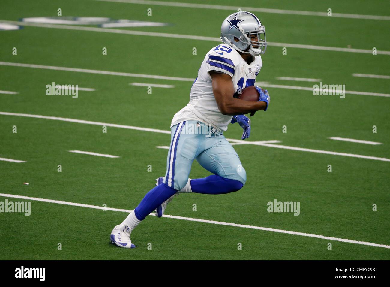 Dallas Cowboys wide receiver Amari Cooper (19) runs after a reception ...