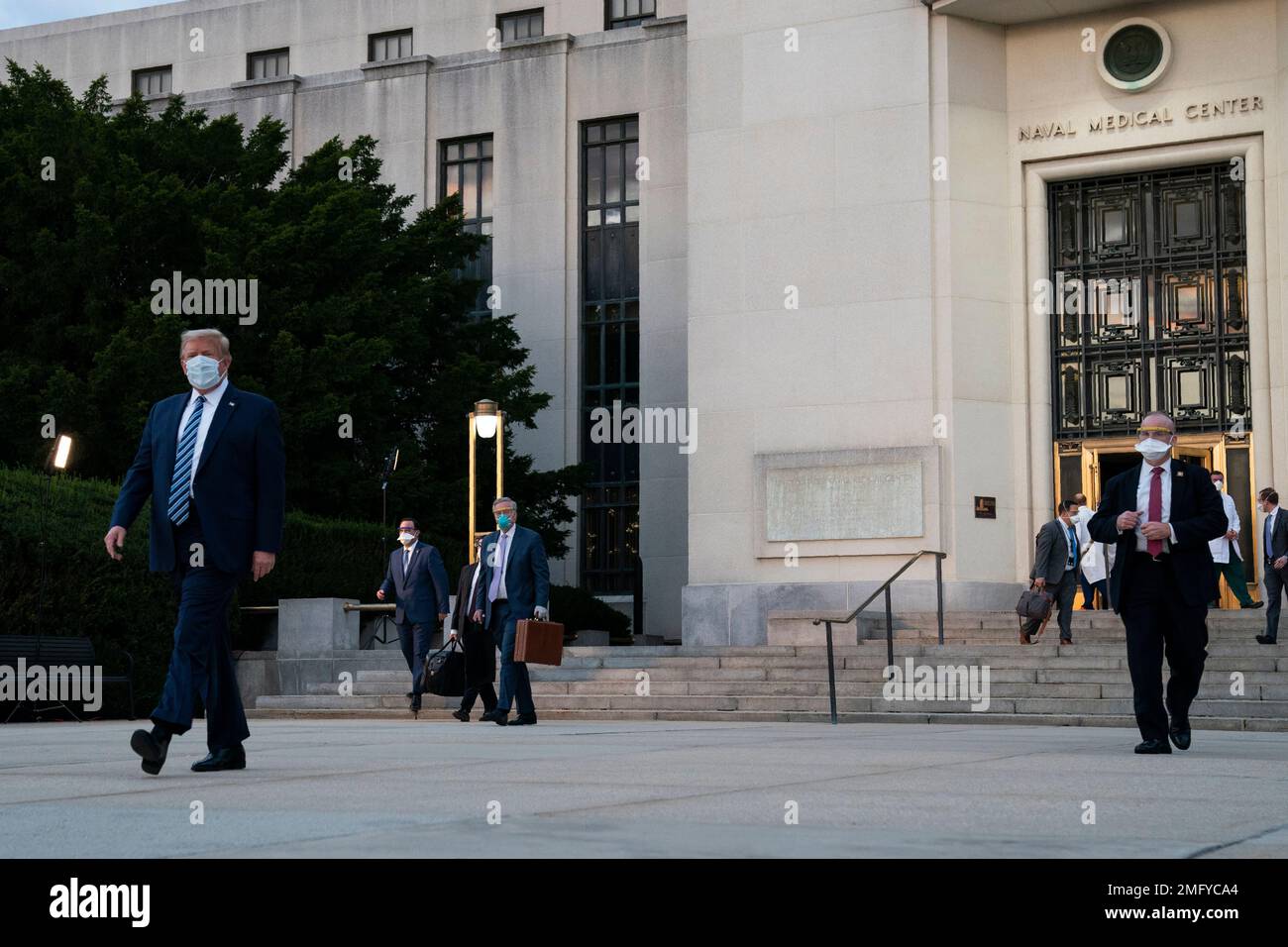 President Donald Trump walks out of Walter Reed National Military ...