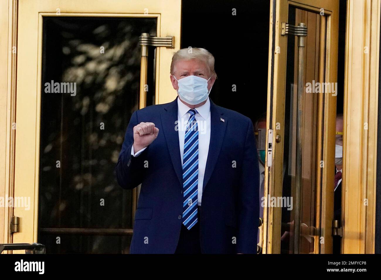 President Donald Trump walks out of Walter Reed National Military ...