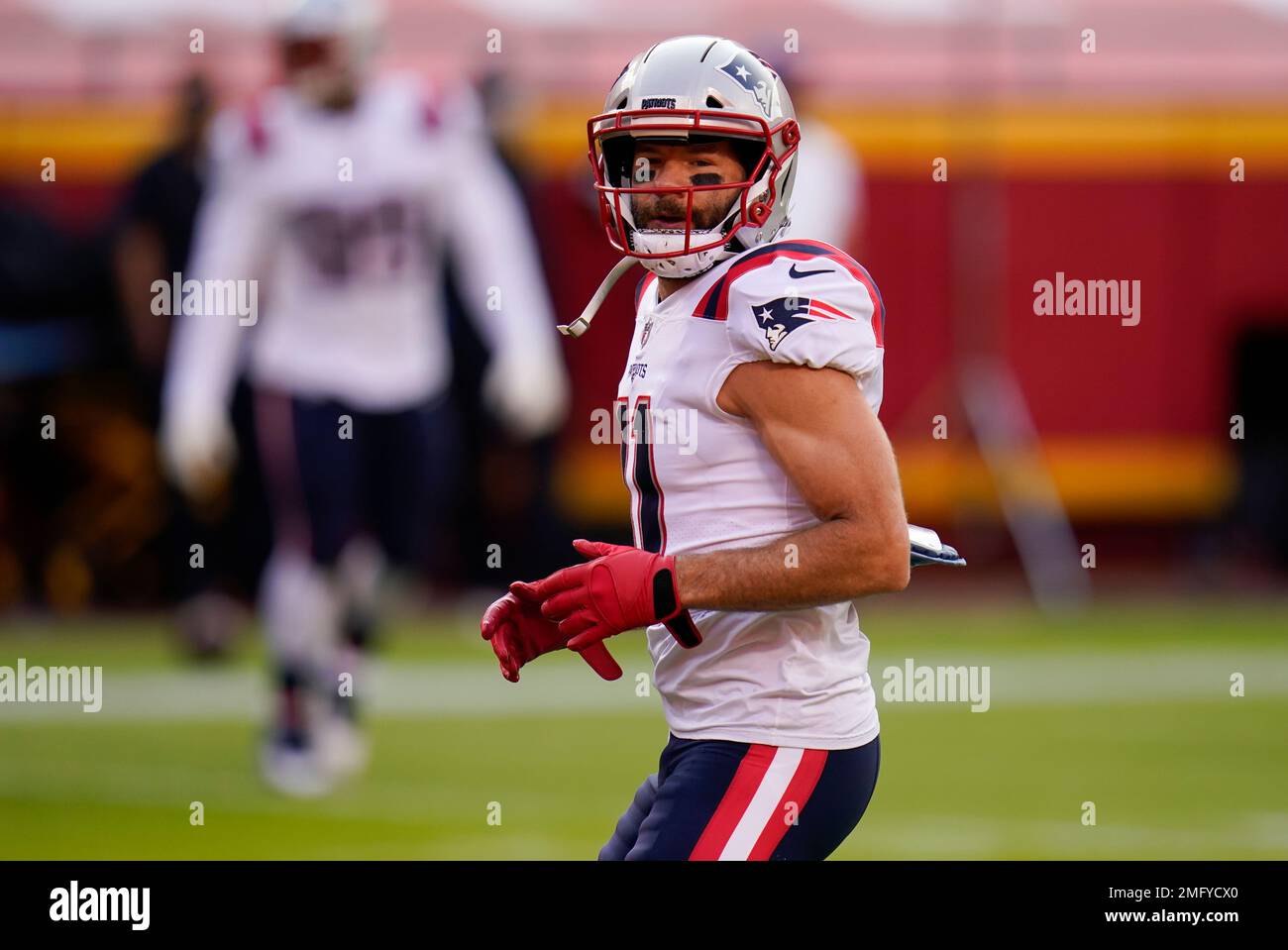 New England Patriots wide receiver Julian Edelman warms up before an ...