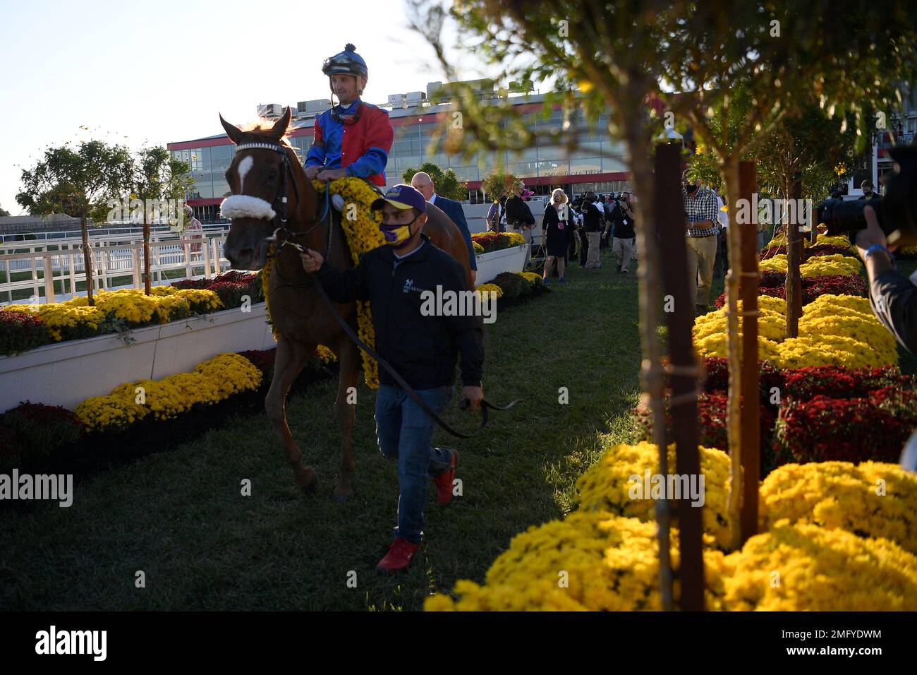 Swiss Skydiver, with Robby Albarado aboard, is led to the winner's ...