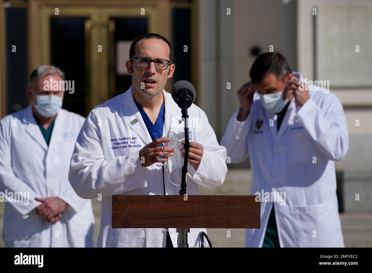 Dr. Brian Garibaldi, talks with reporters at Walter Reed National ...