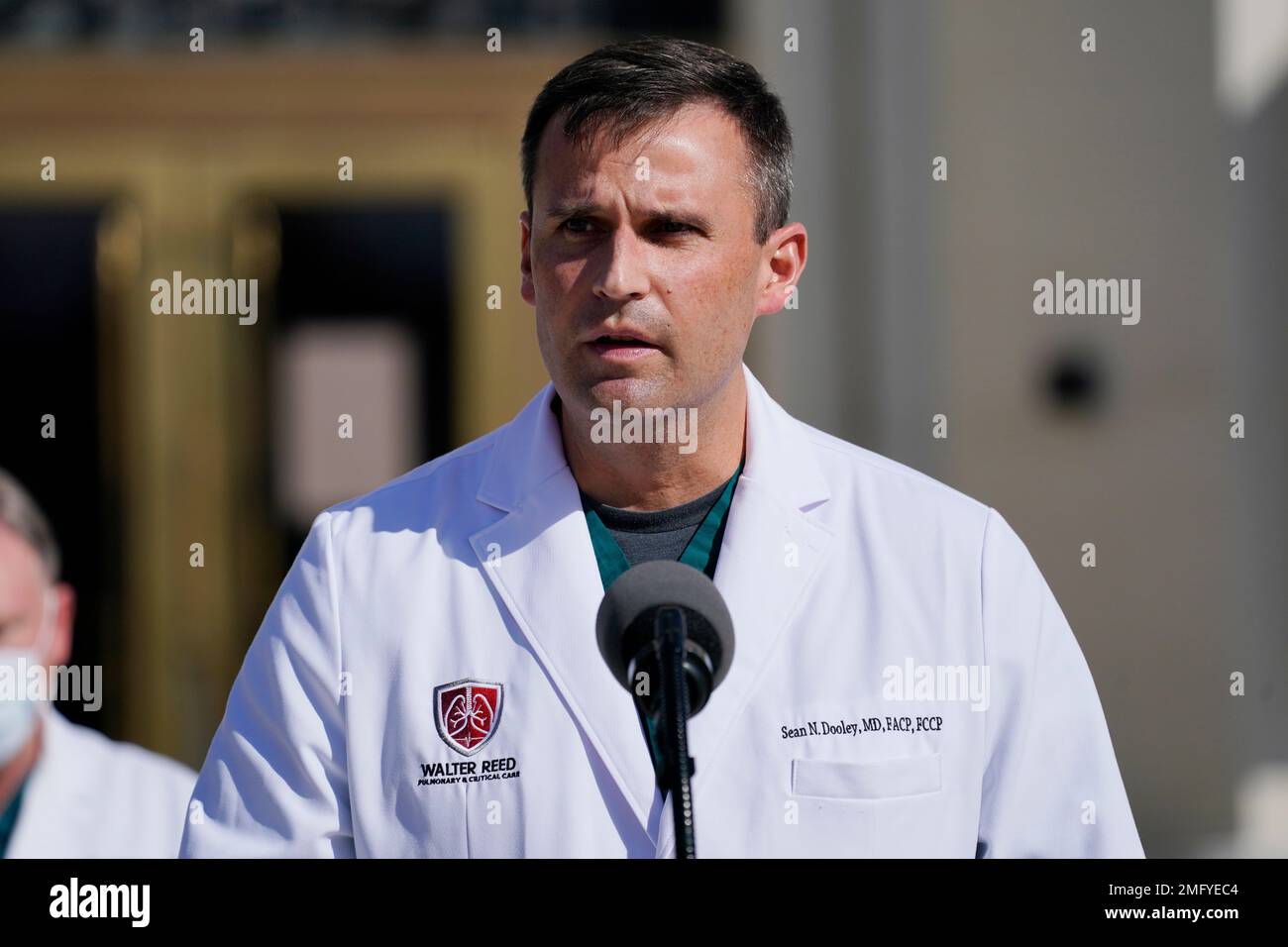 Dr. Sean Dooley, talks with reporters at Walter Reed National Military ...