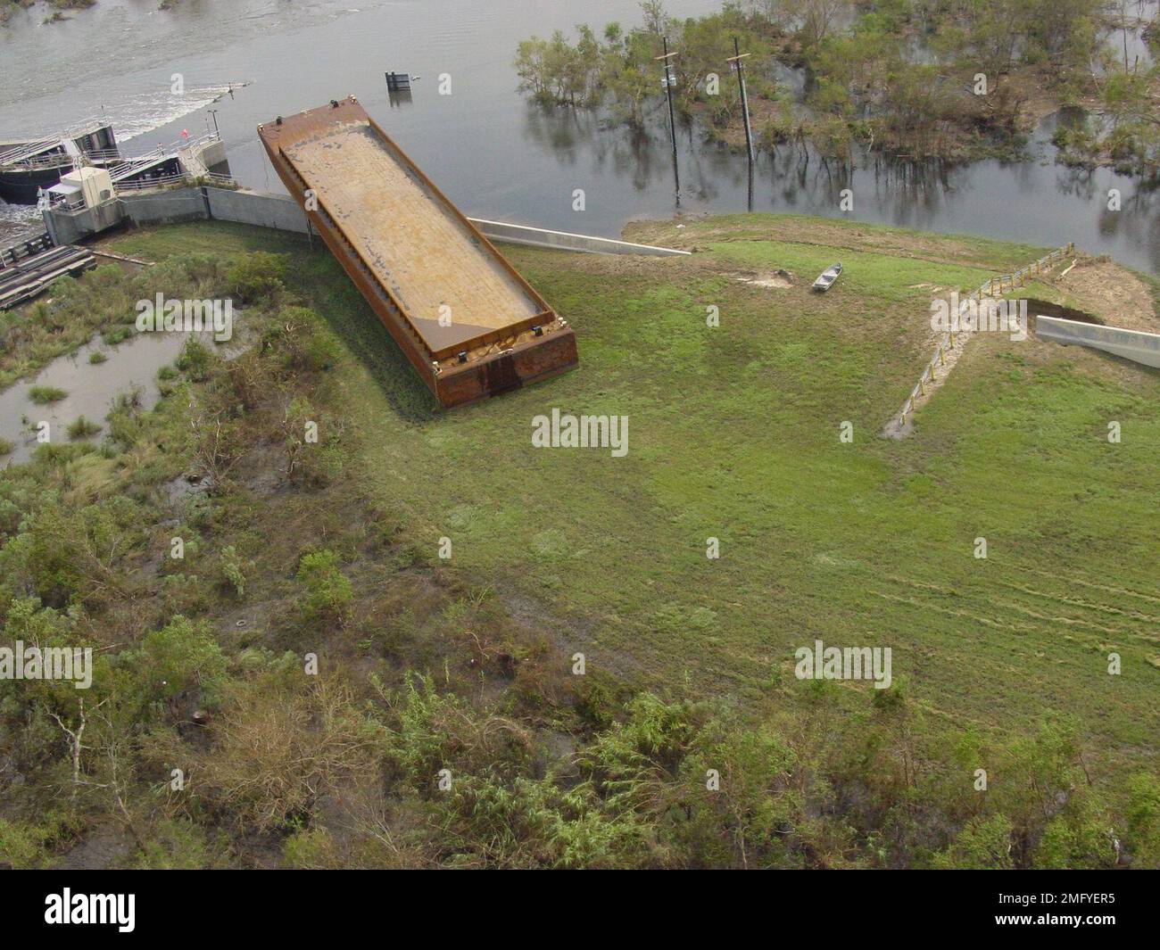 Aftermath - Aerial - 26-HK-330-61. MRGO levee Barge. Hurricane Katrina ...