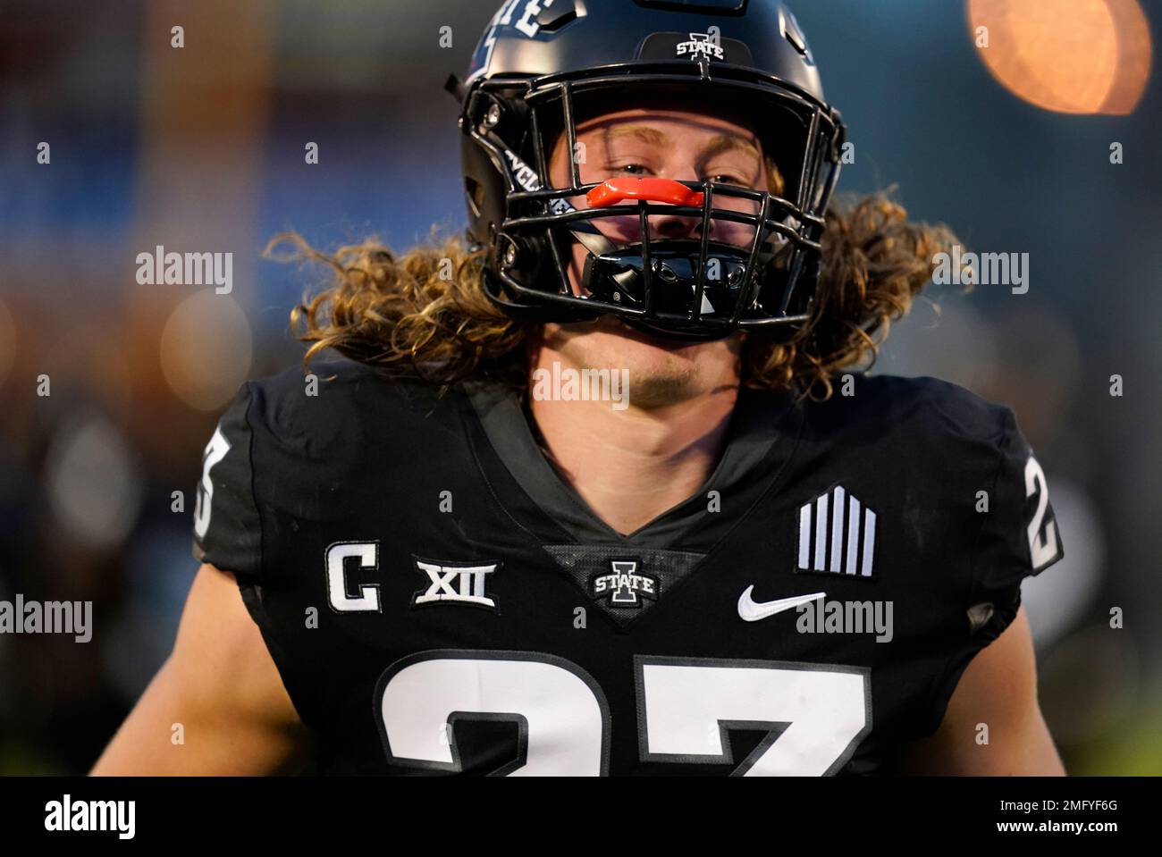 Iowa State linebacker Mike Rose runs onto the field before an NCAA ...