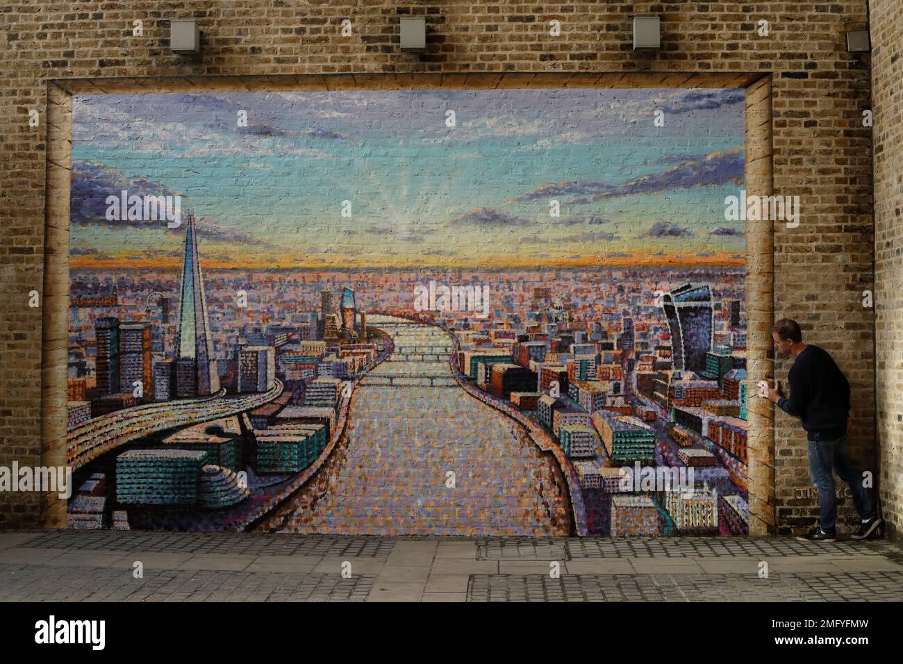 Australian street artist James Cochran, also known as Jimmy C, poses to ...