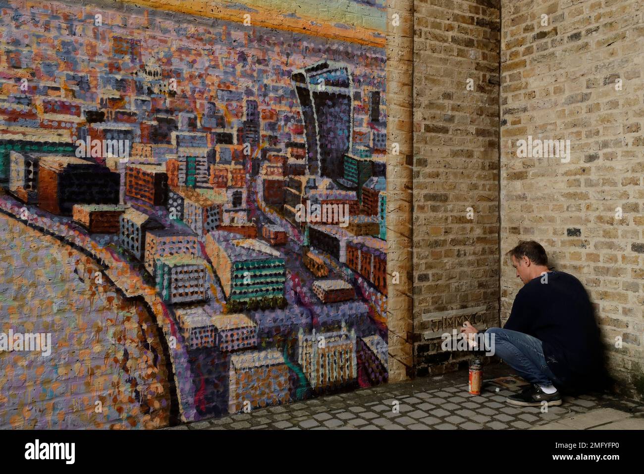 Australian street artist James Cochran, also known as Jimmy C, signs ...