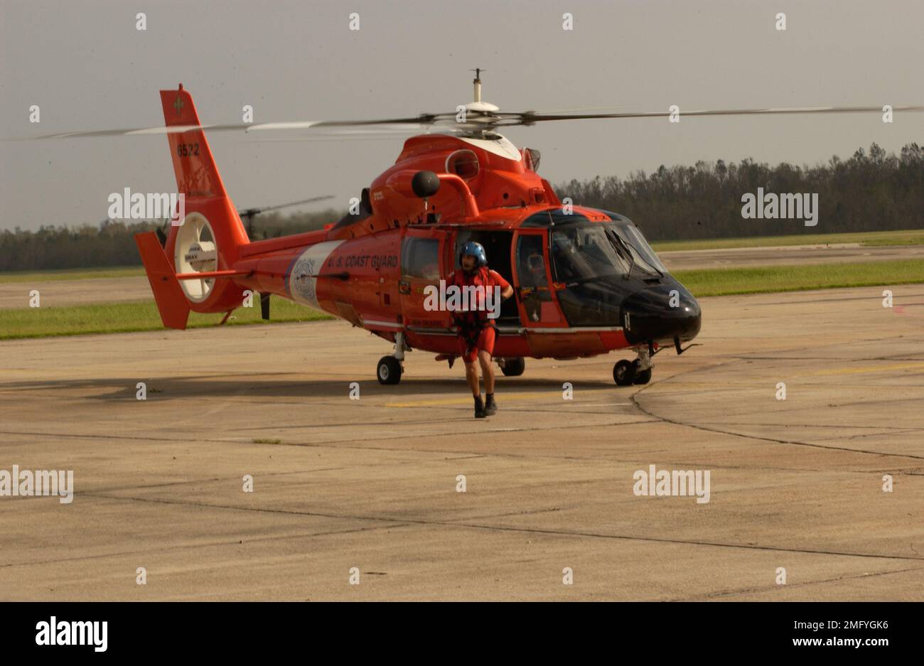 Aircrafts - HH-65 Dolphin - 26-HK-54-22. Rescue swimmer disembarking ...