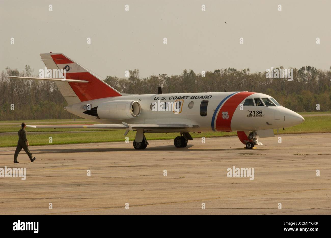 Aircrafts - HU-25 Guardian - 26-HK-55-24. Coast Guardsman walking ...