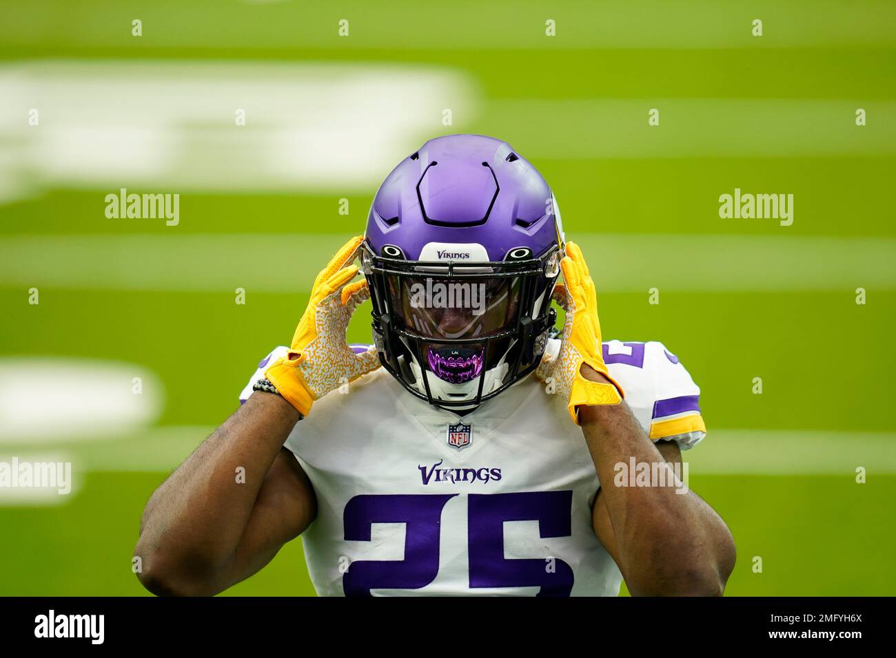 Minnesota Vikings running back Alexander Mattison (25) adjusts his ...