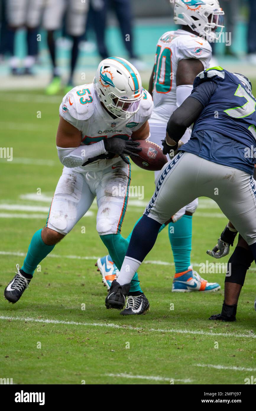 Seattle Seahawks tackle Jamarco Jones (73) strips the ball out of the ...
