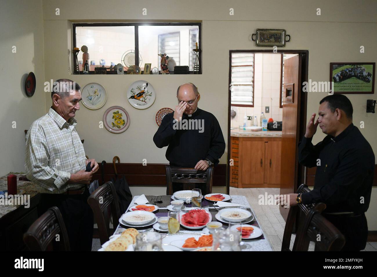 Father Honegger Molina, center, father, Jose Molina, left, and his ...